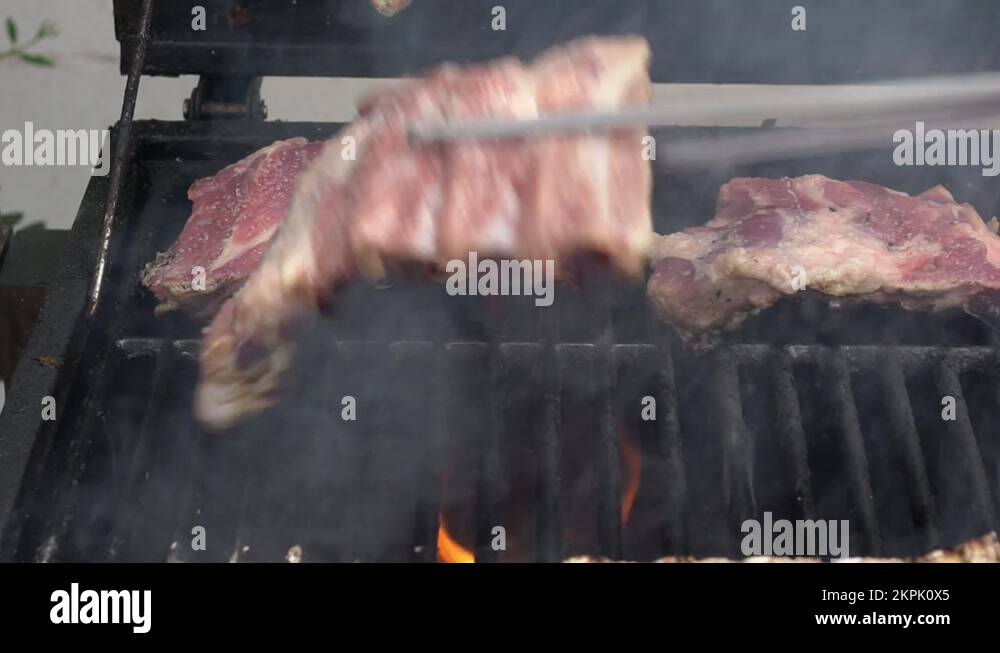 Pig ribs on bbq Stock Videos & Footage - HD and 4K Video Clips - Alamy