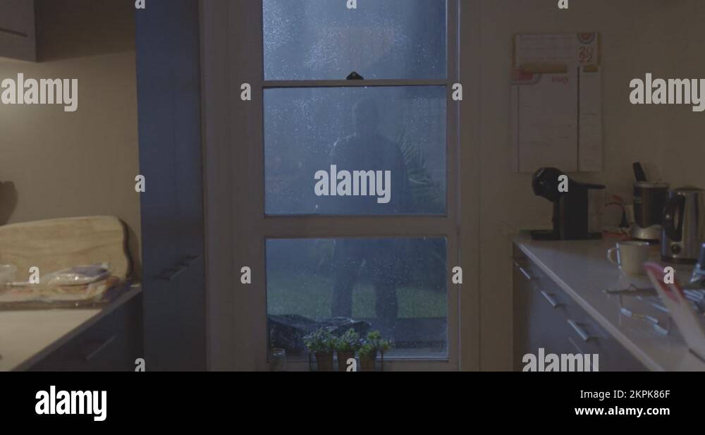 Stalker woman window Stock Videos & Footage - HD and 4K Video Clips - Alamy
