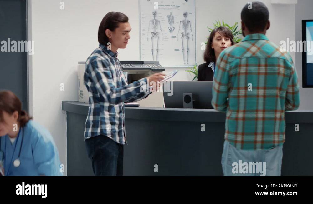 Busy receptionist Stock Videos & Footage - HD and 4K Video Clips - Alamy