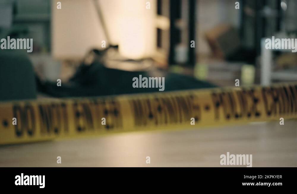 Dead victim in body bag lying on floor, trashed crime scene with ...