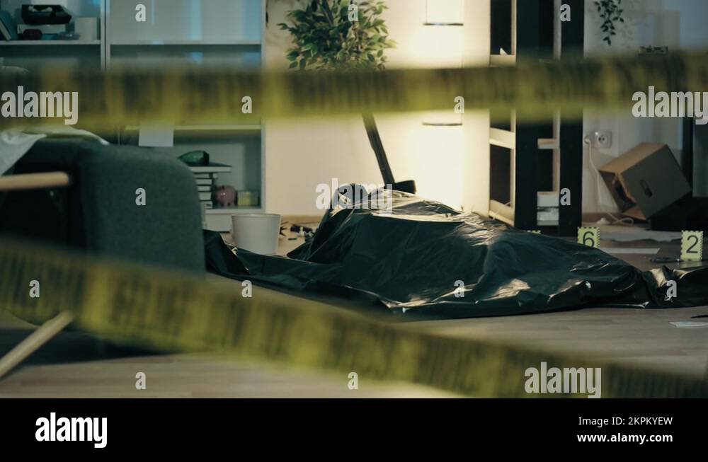 Dead body on floor in plastic bag, evidence marks in messy room, murder ...