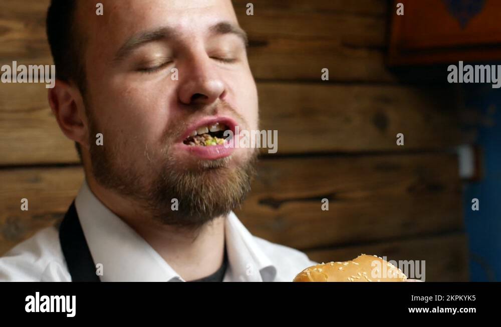 Young man eating junk food restaurant Stock Videos & Footage - HD and ...