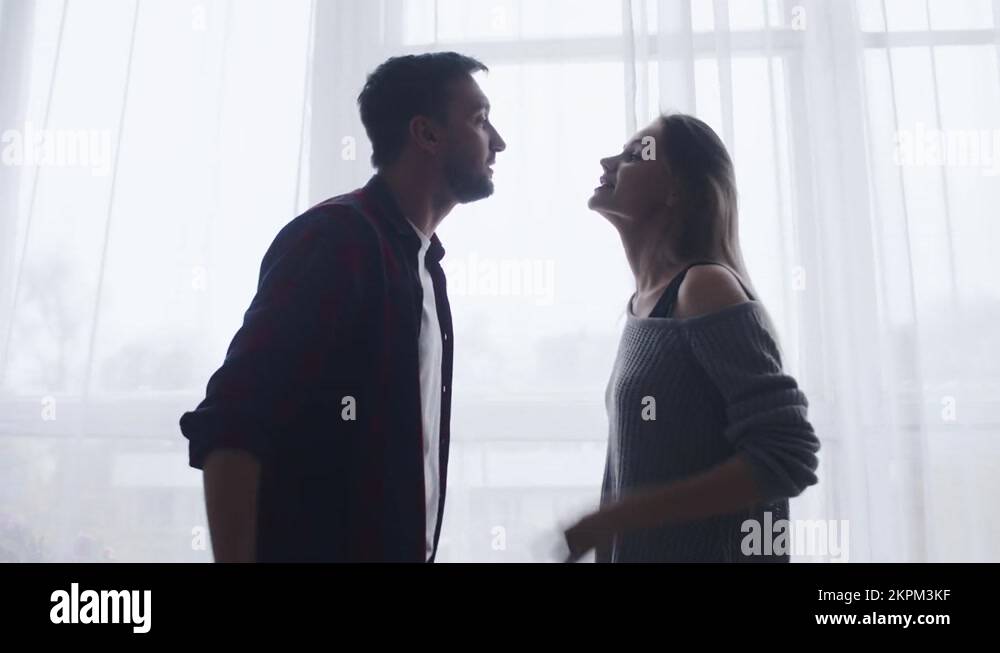 Stressed young married family couple arguing emotionally, blaming ...