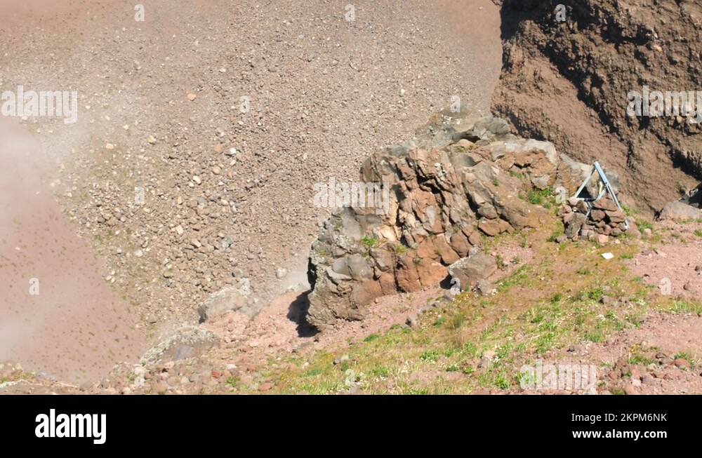 Close up shot of smoke coming out of the crater of Mount Vesuvius ...