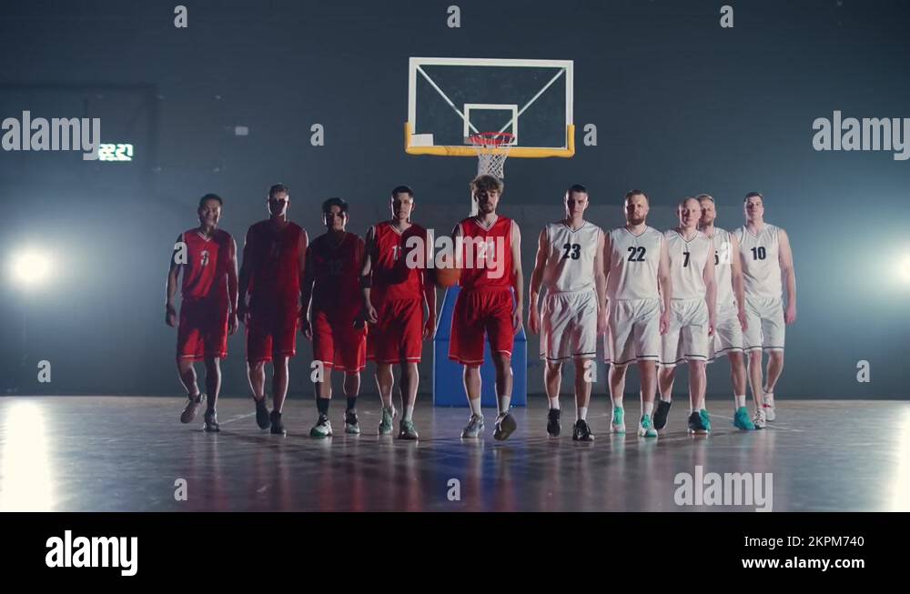 Performance, two team of basketball players in the playground ...