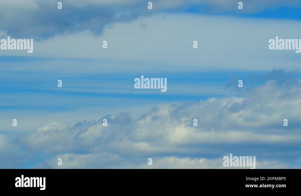 White clouds background. Blue sky with copyspace background. Time lapse ...