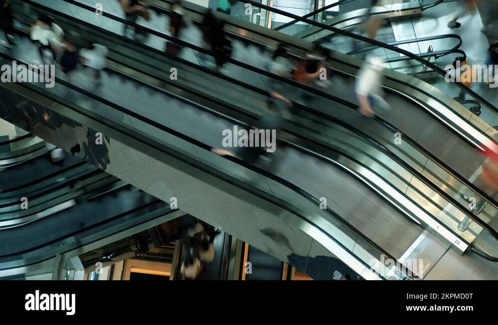 People in escalators at the modern shopping mall. Time lapse Stock Video Footage - Alamy