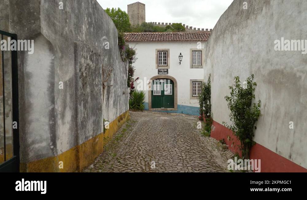 Narrow Street in Castle of Óbidos with Crossroad at the End of Road ...