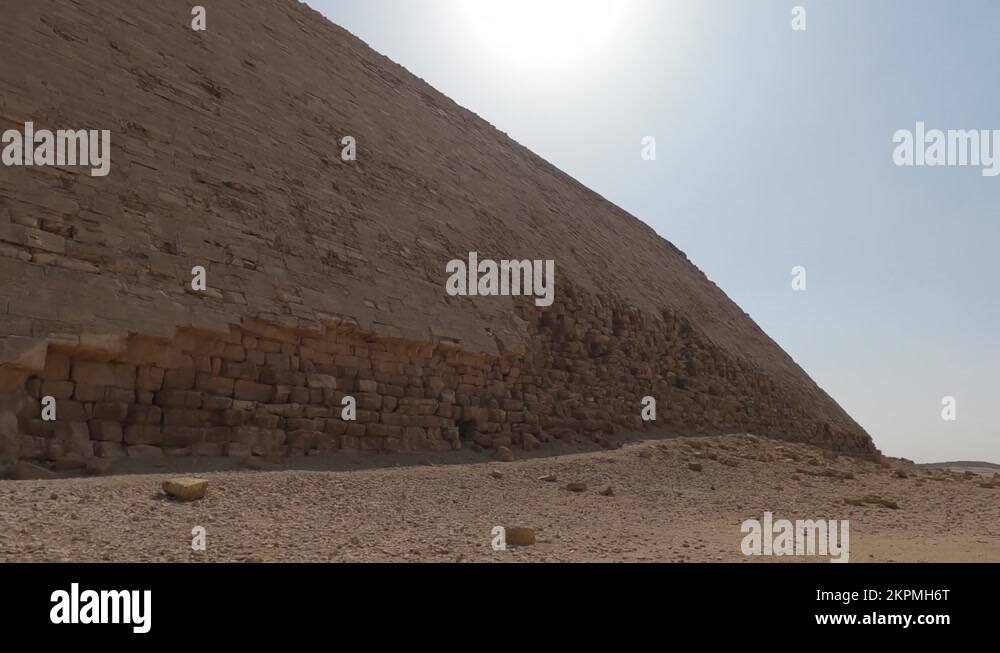 Ground Level View Of Base Of Bent Pyramid In Dahshur Egypt. Slow Pan ...