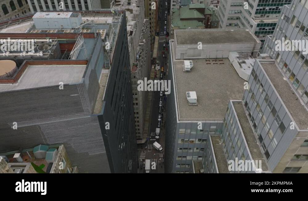 Backwards reveal of high rise apartment buildings in urban borough. Fly ...