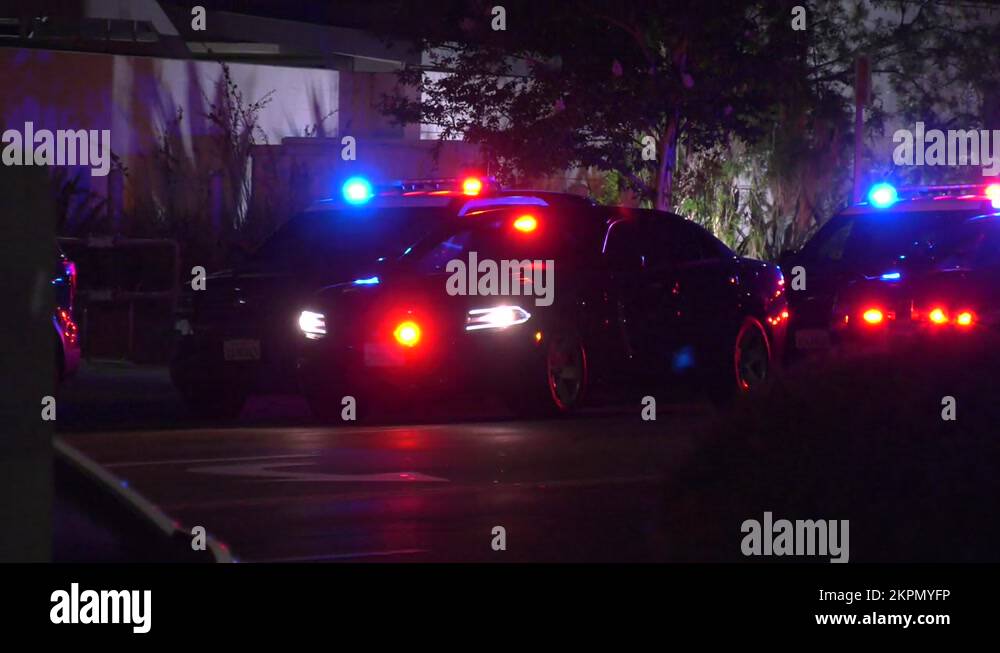 Cop cars night Stock Videos & Footage - HD and 4K Video Clips - Alamy