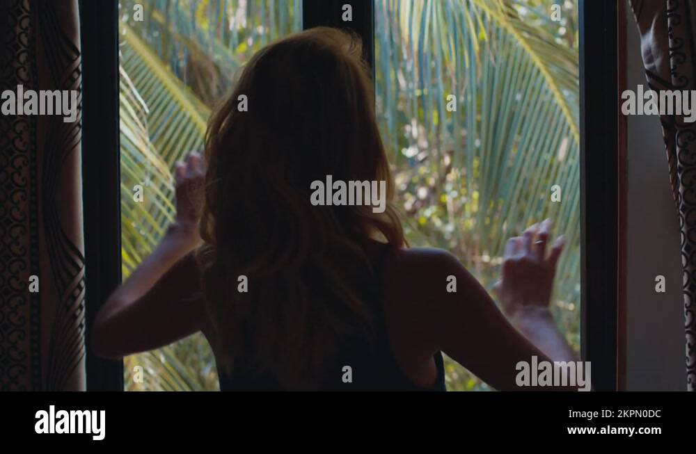 Woman sad window Stock Videos & Footage - HD and 4K Video Clips - Alamy