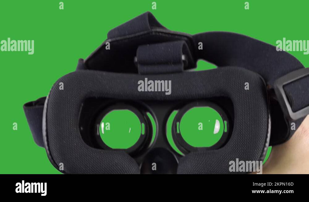 Holding a VR Virtual Reality Headset with green screen chromakey Stock ...