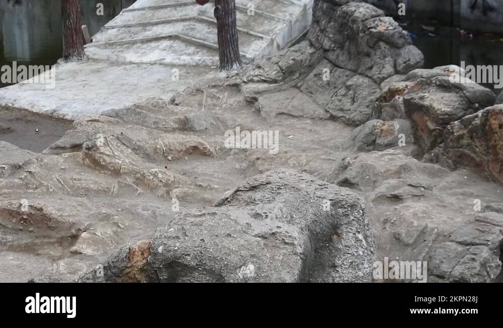 Malin Kundang rock formation at Padang, West Sumatra Indonesia. Air ...