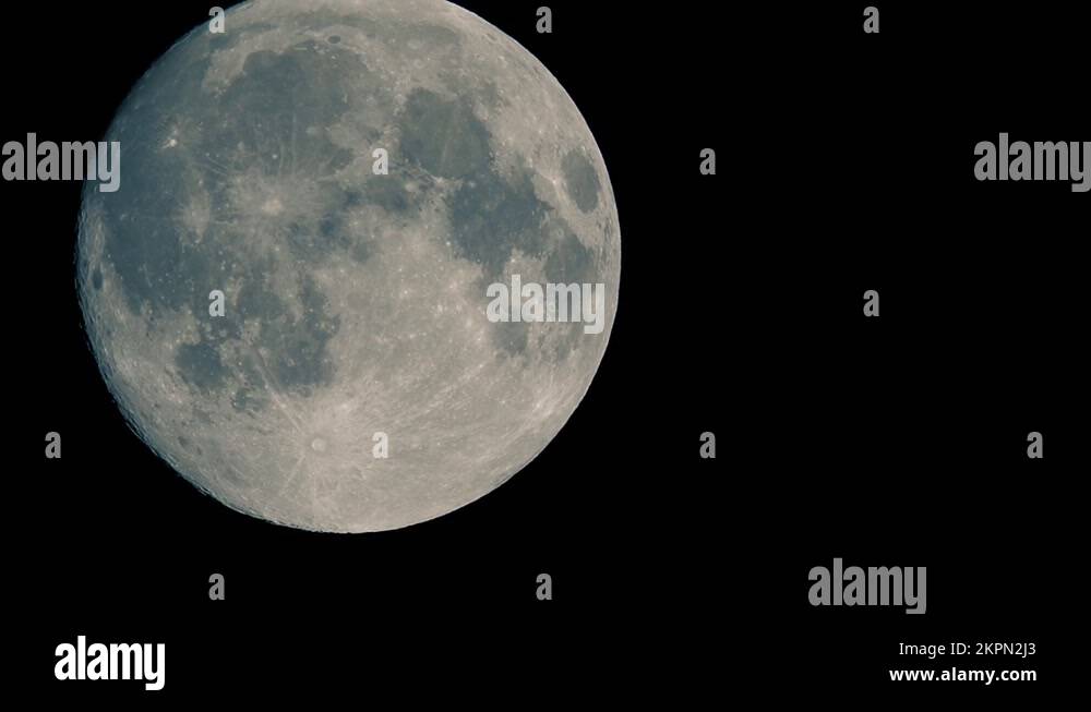 Full moon moves fast at night sky. Sharp footage of full moon with ...