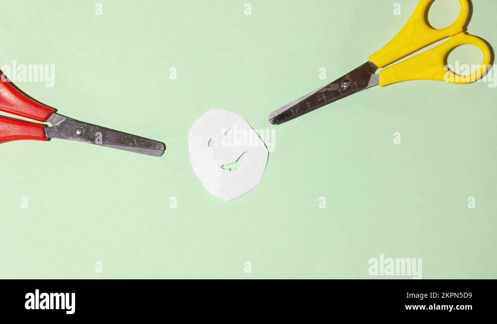 Funny stop motion animation with scissors felt-tip pen and paper Stock ...