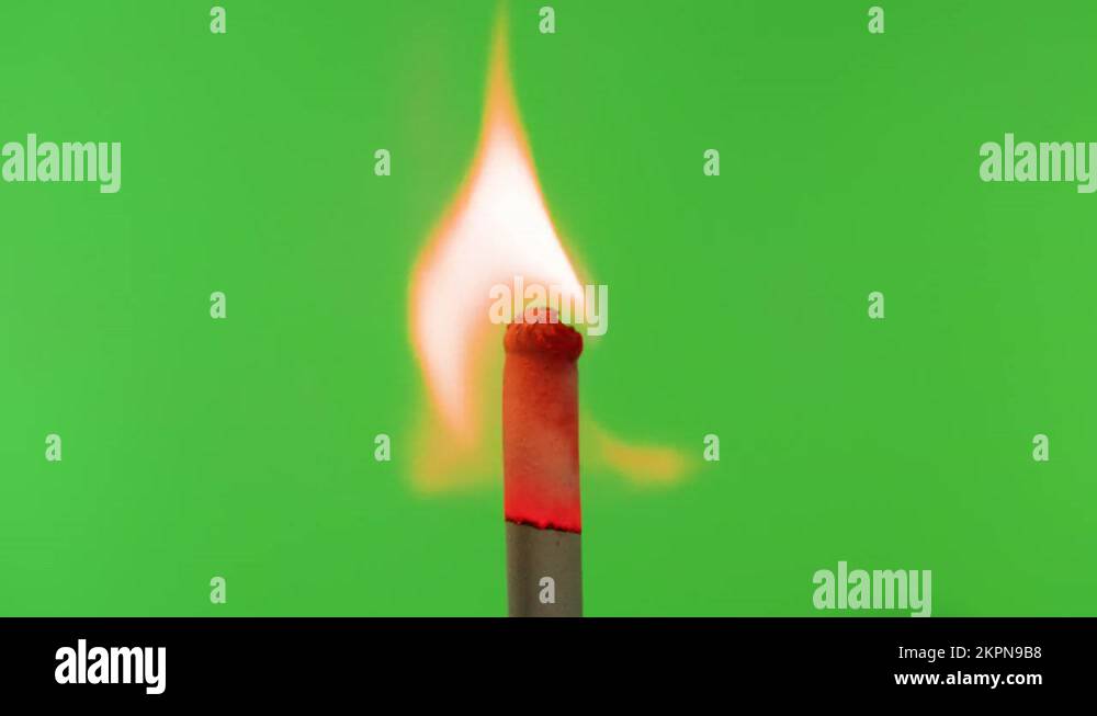 Burning match on green chroma key background. Fire flame from ...