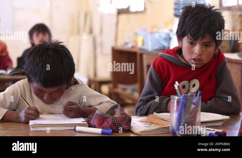 At a primary school in the Andes Mountains in Bolivia, children focus ...