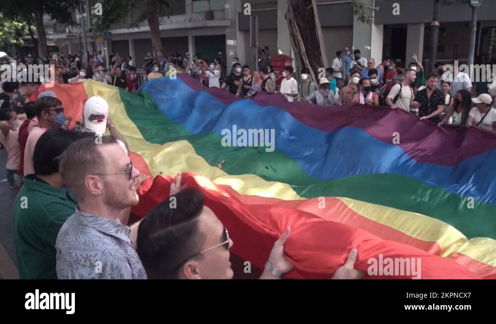 Members of the LGBTQ community and allies take part in a Pride month ...