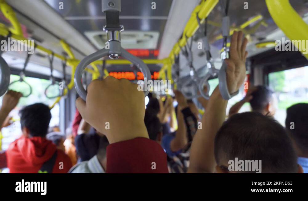 Handles standing passenger inside bus transportation Stock Videos ...