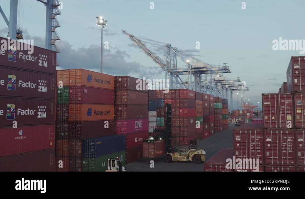 Forklift Truck Lifting Cargo Container At The Husky Terminal, Tacoma ...