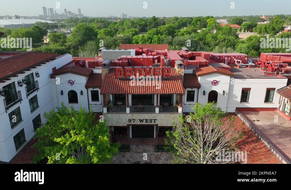 Shopping in historic Fort Worth Stockyard. City skyline reveal Stock ...