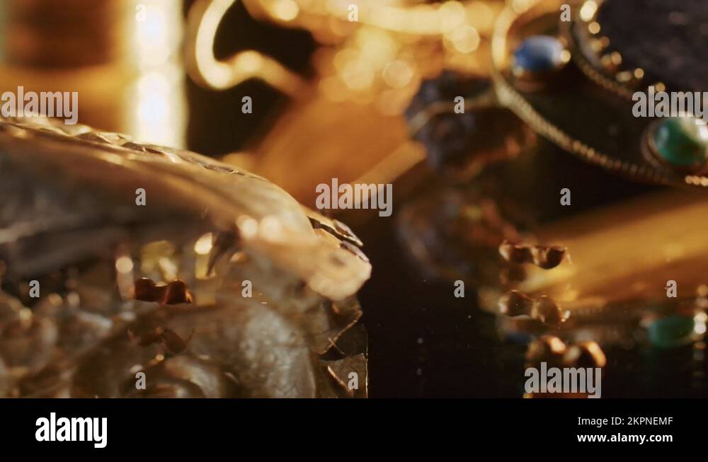 gold jewelry of a Scythian priestess 2000 years old, an old earring, a ...