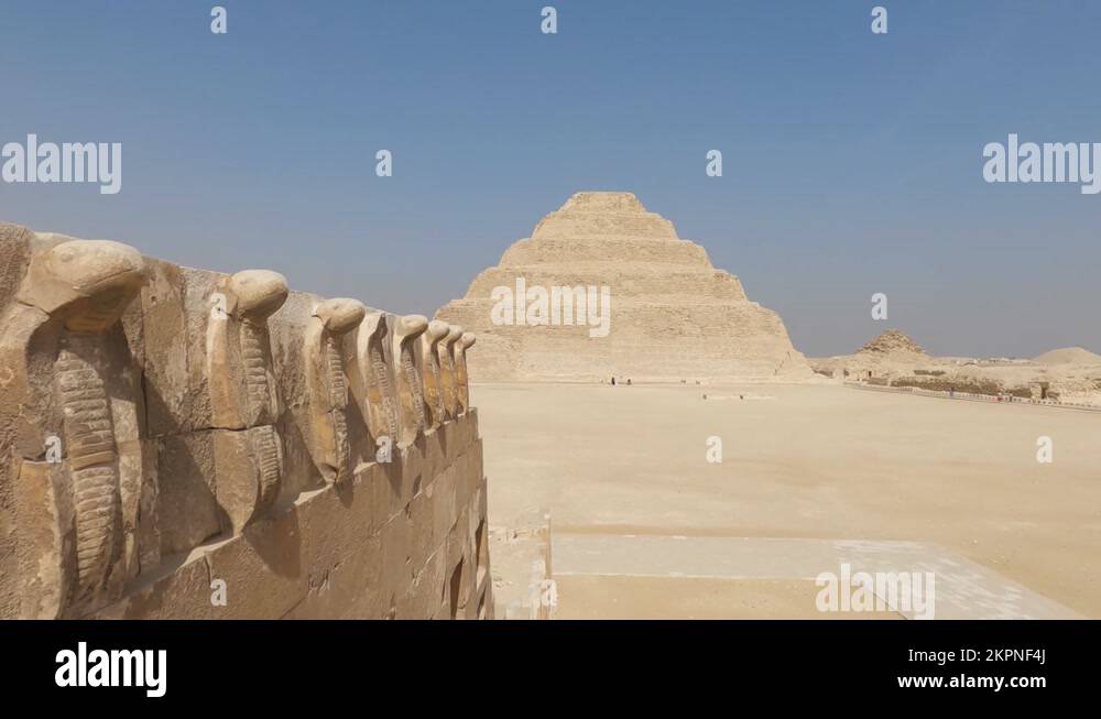 Snake Sculpted Stone With View Of Step Pyramid At Saqqara In The ...