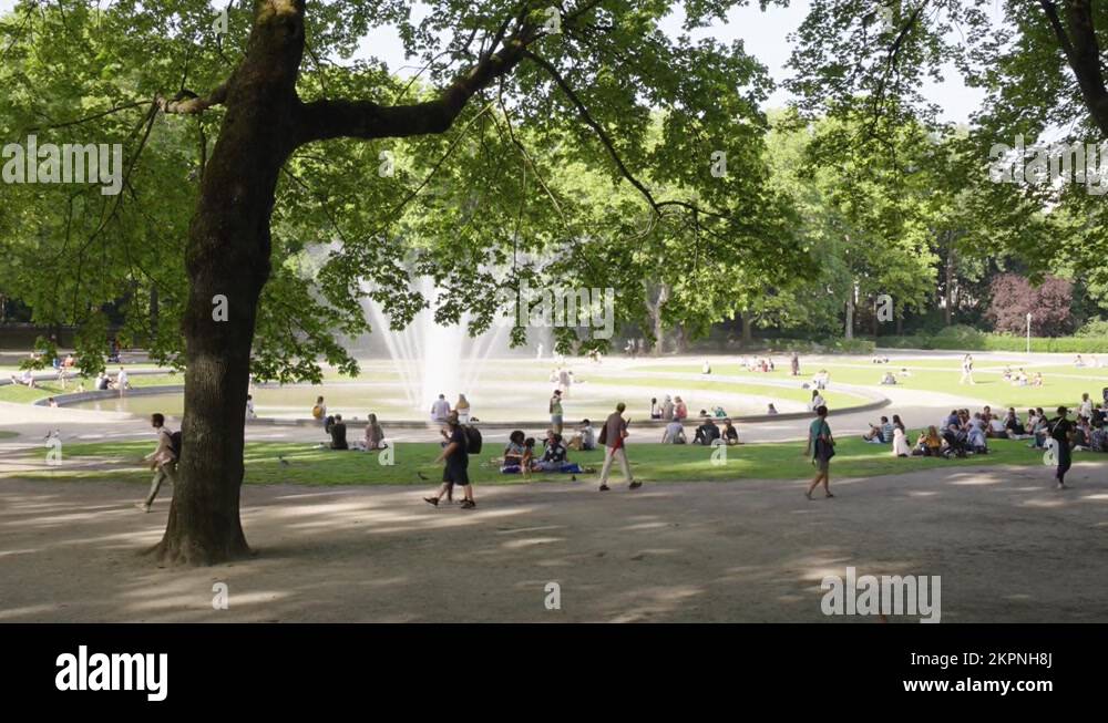 People Hanging Out At Square de la Bouteille With Water Fountain In ...