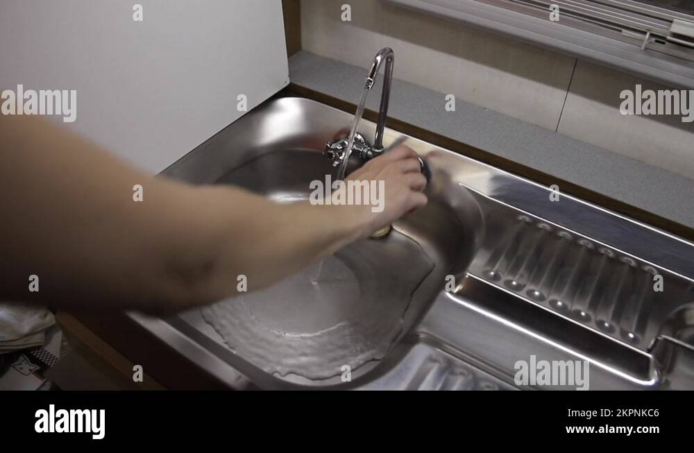 Closing a water tap inside an old RV Camper Van. Closing an indoor ...