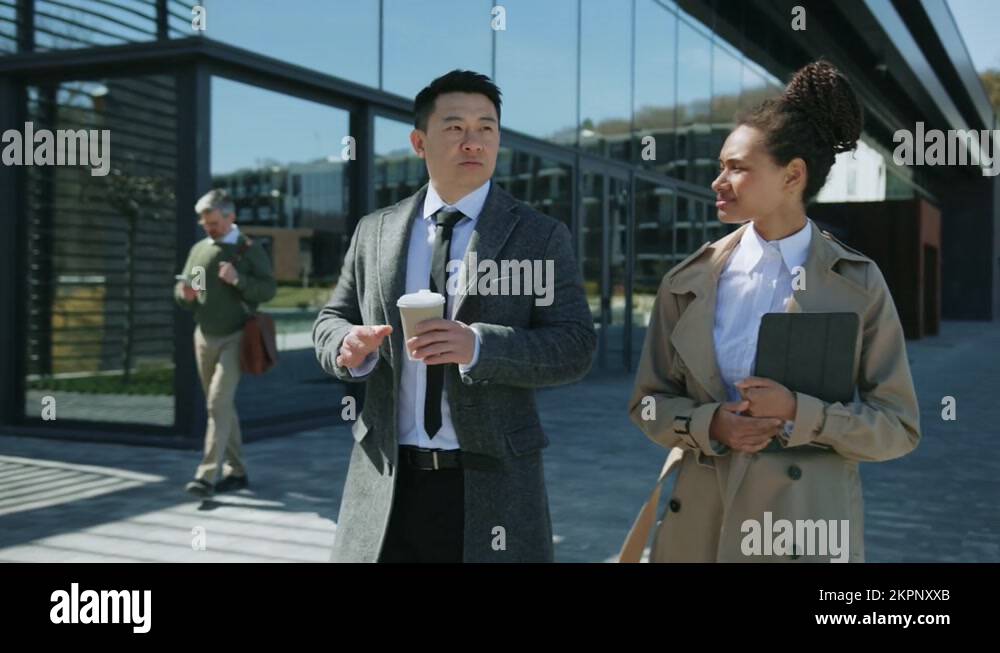 Two young people talking outside Stock Videos & Footage - HD and 4K ...