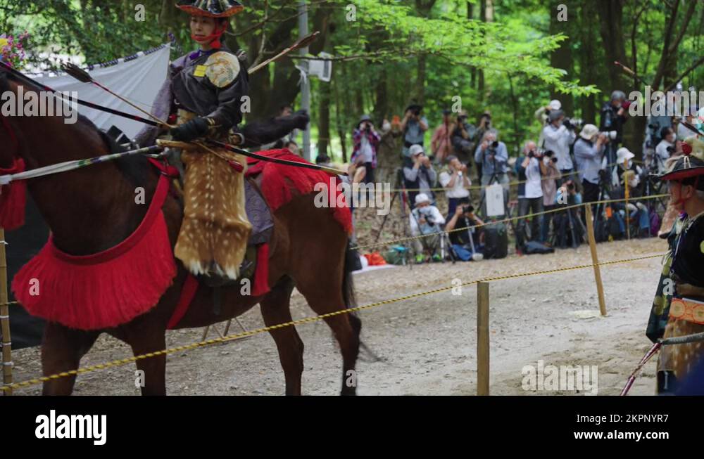 Samurai Archers Ride Pass Crowd at Yabusame Event at Omi Jingu Shrine ...