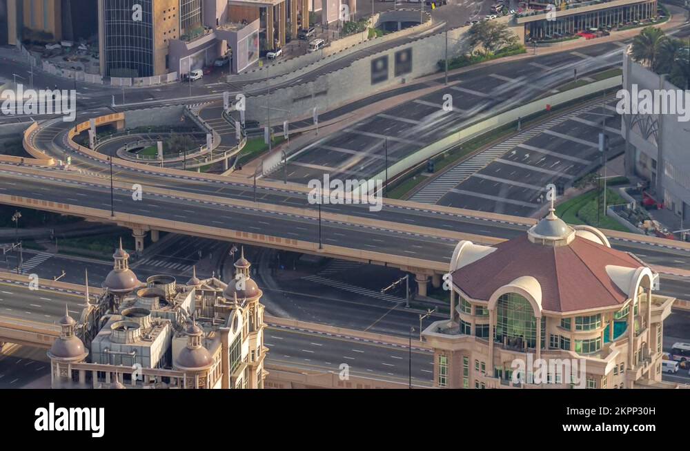 Bussy traffic on the overpass intersection in Dubai downtown aerial ...