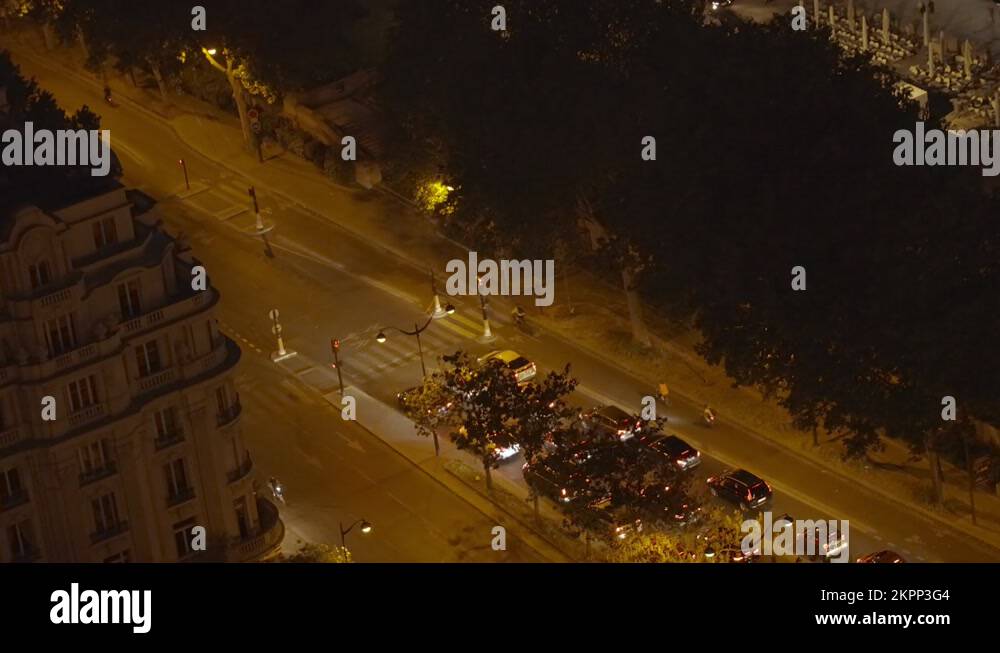Cars starting at green light on the Quai de Beaugrenelle at night in ...