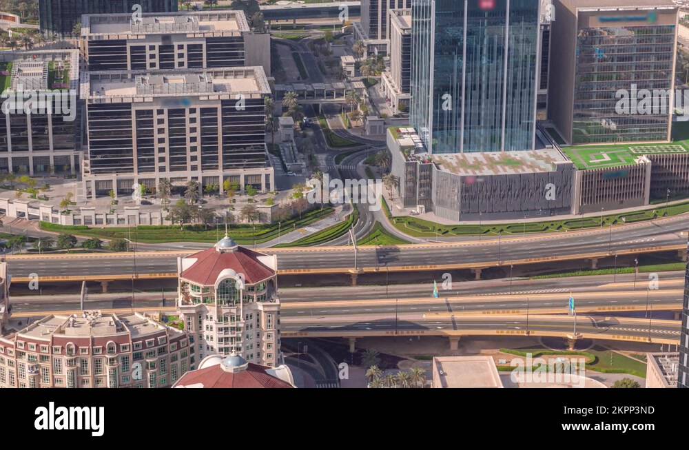 Bussy traffic on the overpass intersection in Dubai downtown aerial ...