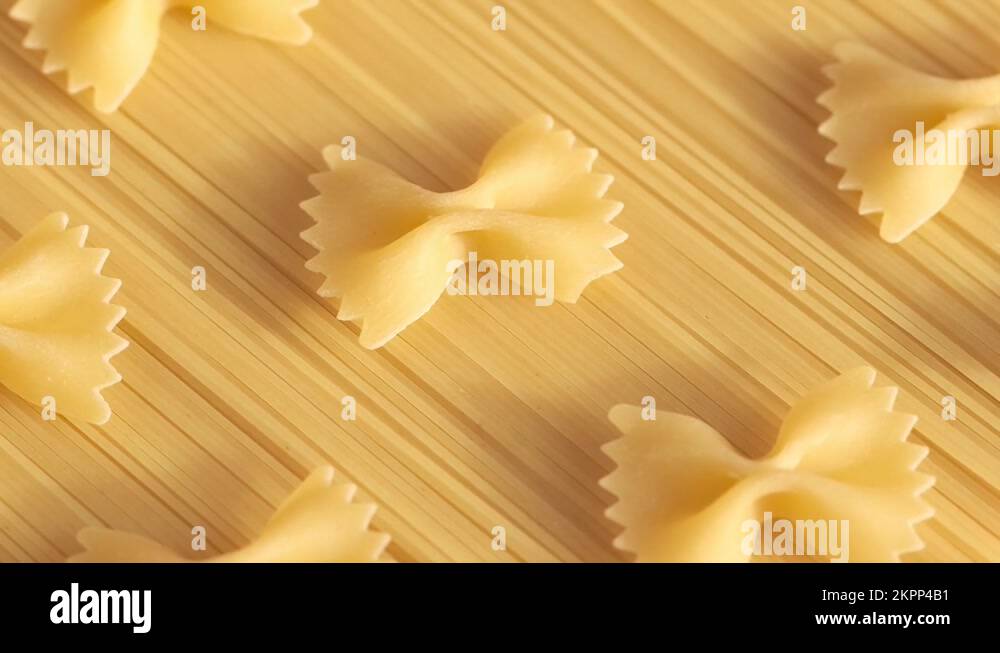 Background Of Spaghetti Pasta. Uncooked Italian Pasta Golden Rotating ...
