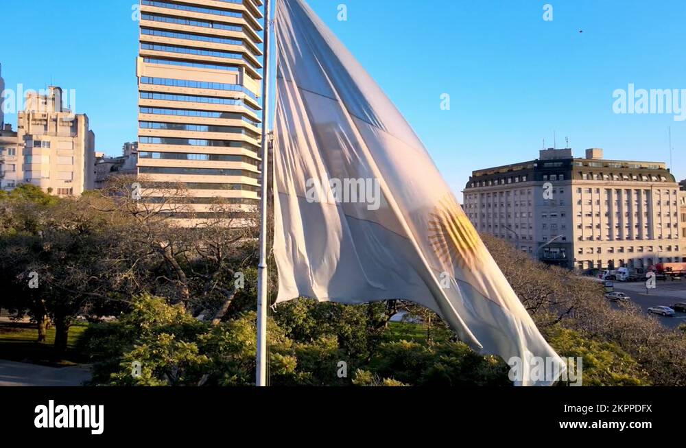 Argentina flag streaming in wind at Monument to the Fallen in Malvinas ...
