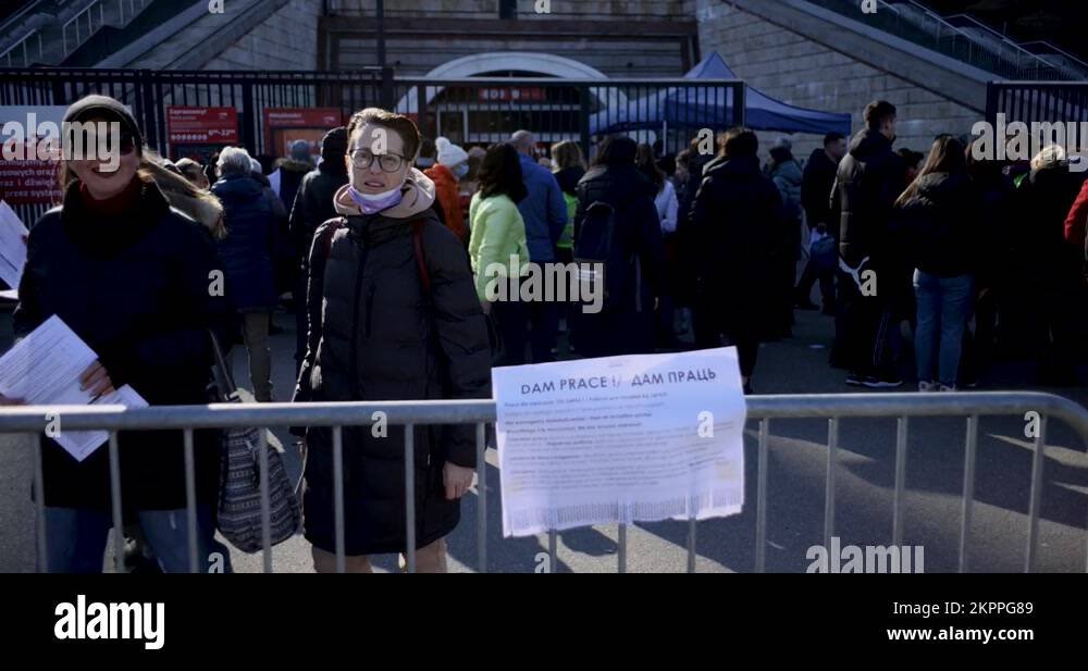 Two women pose to the camera at the registration center on the National ...