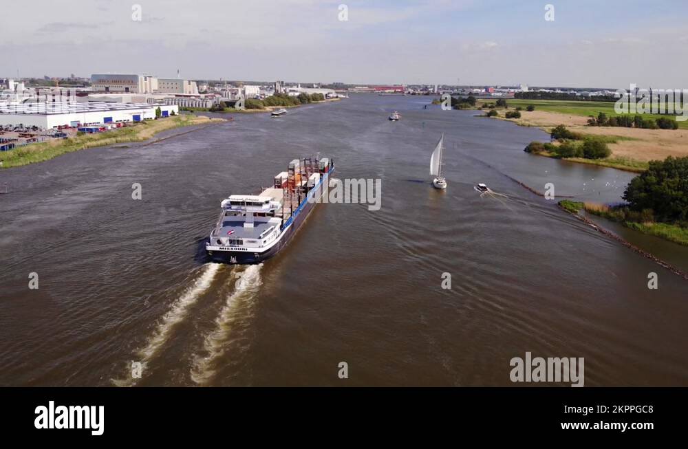 Bird's Eye View Of Cargo Vessel Transporting Intermodal Containers In ...