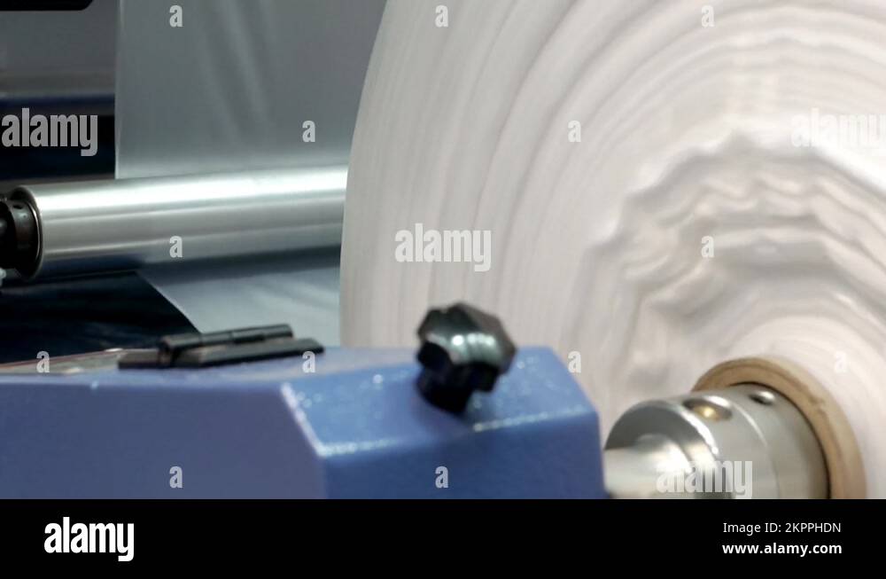 Rotating rolls with wound polyethylene film Stock Video Footage - Alamy