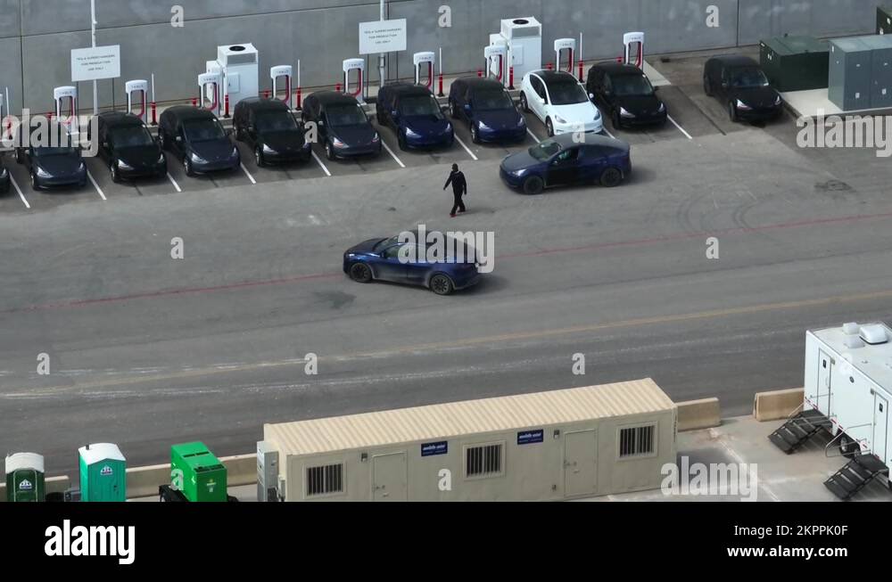 Tesla car line-up at Giga Texas charging station. Brand new cars get ...