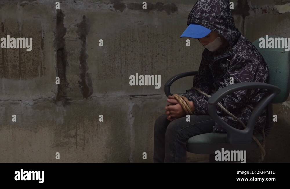 child abduction. a child in the basement. kidnapped Stock Video Footage ...