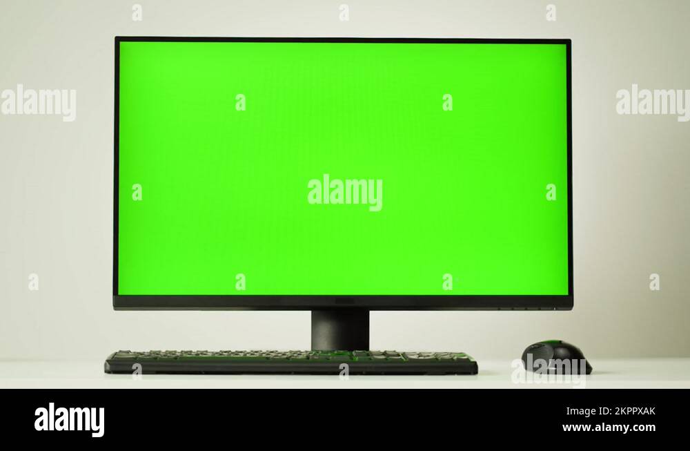 Computer with chroma key close-up. Green screen on monitor. Doctor ...