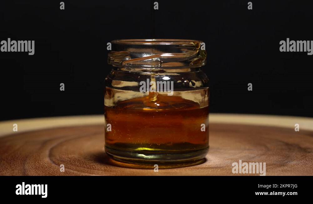 Pouring in glass jar Stock Videos & Footage - HD and 4K Video Clips - Alamy