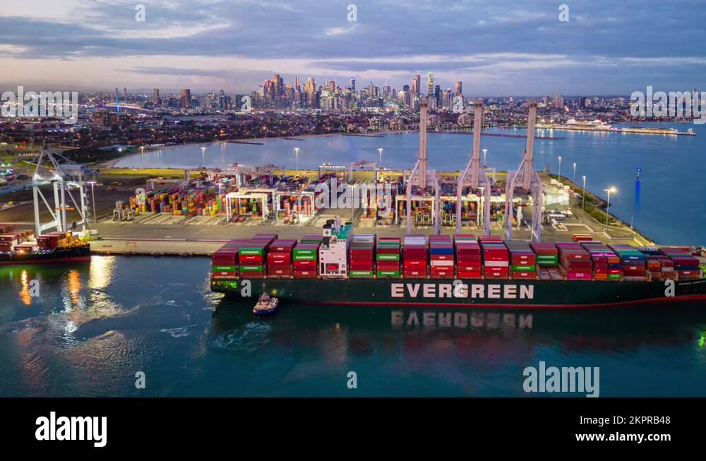 Aerial hyperlapse video of container ship arriving at Port of Melbourne ...