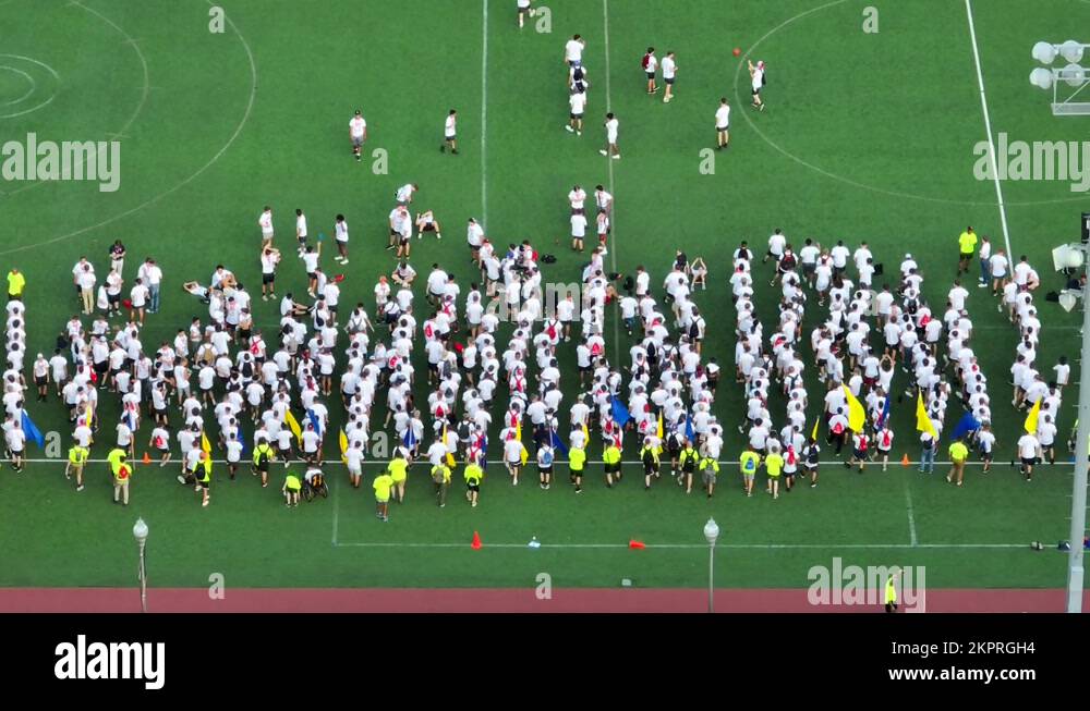College students practice dance moves and exercises on university ...