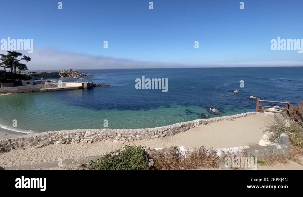 Empty beach after a shark attacks a swimmer at Lover's Point Beach in ...