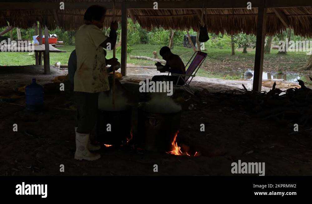 Cooking process of village people living at the river Stock Video ...