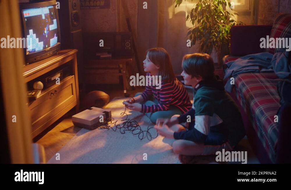 Two Kids Playing Nostalgic Arcade Game Home Video Concept Stock Video ...