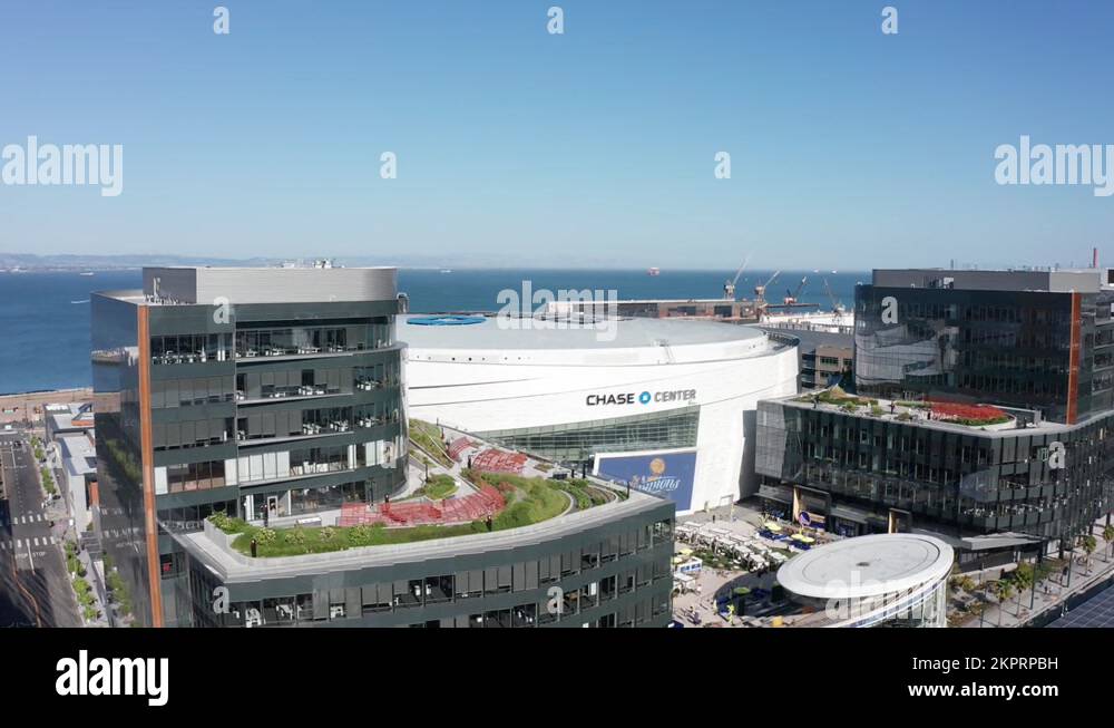 Wide push-in aerial shot of the Chase Center basketball arena, home of ...